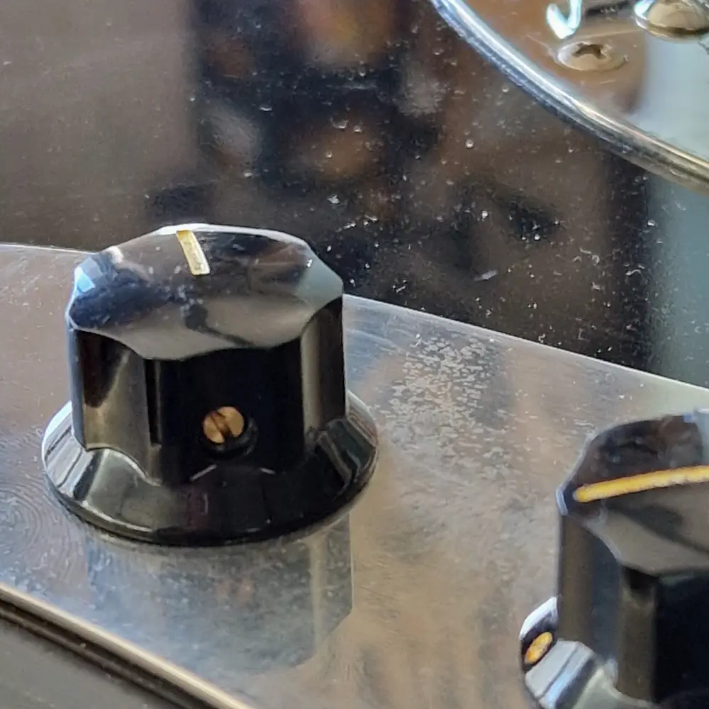 Aged Jaguar Skirted Black Knobs